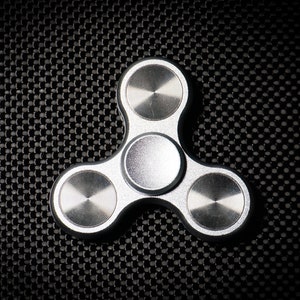 The Classic Fidget Spinner Tri Shape Metal Spinner, in Black, Silver ...