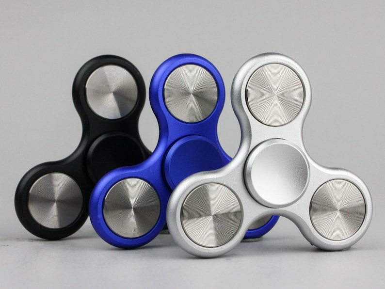 The Classic Fidget Spinner Tri Shape Silver or Black Hand - Etsy
