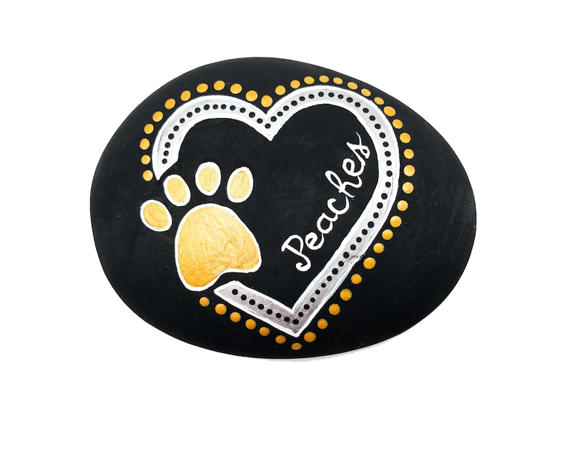 Dog paw prints on rocks - leatherress