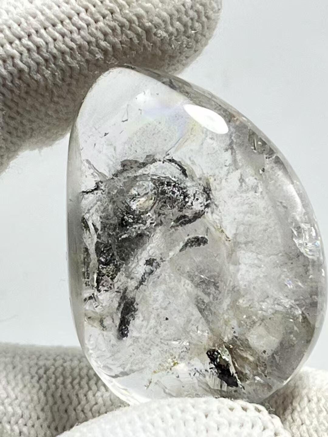 A Big Bubble and Black Quicksand Moving Smoothly in Enhydro Quartz ...