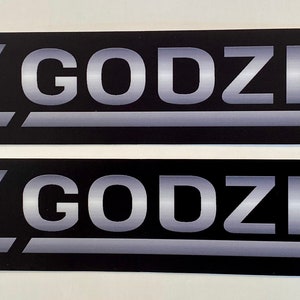 2 Godzilla 7.3 L ...badge..emblem.. Sticker.....fits Ford F250 & F350 ...