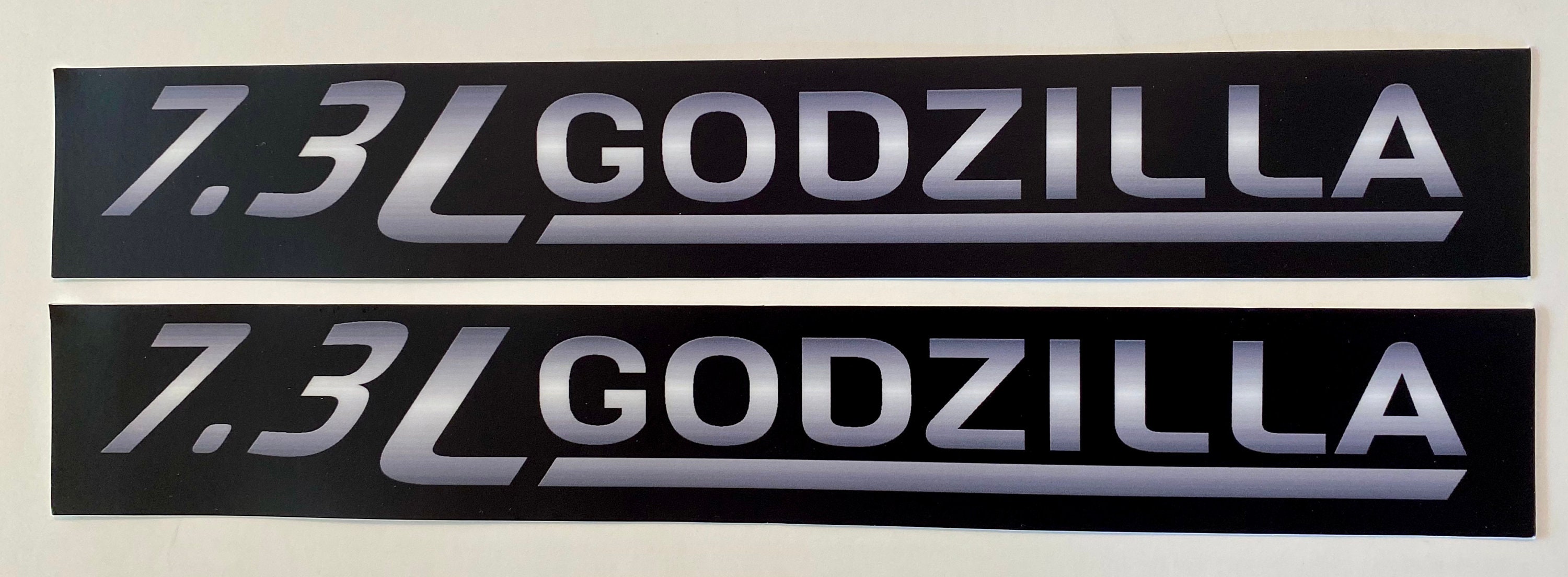 2 Godzilla 7.3 L ...badge..emblem.. Sticker.....fits Ford F250 & F350 ...