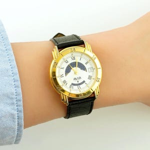 Vintage Avia Men’s Moon Phase Watch: Gold Tone Case, Black Leather ...