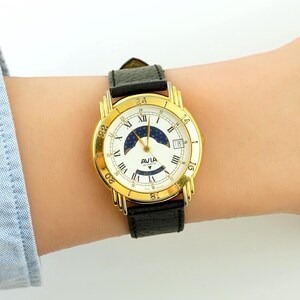 Vintage Avia Men’s Moon Phase Watch: Gold Tone Case, Black Leather ...