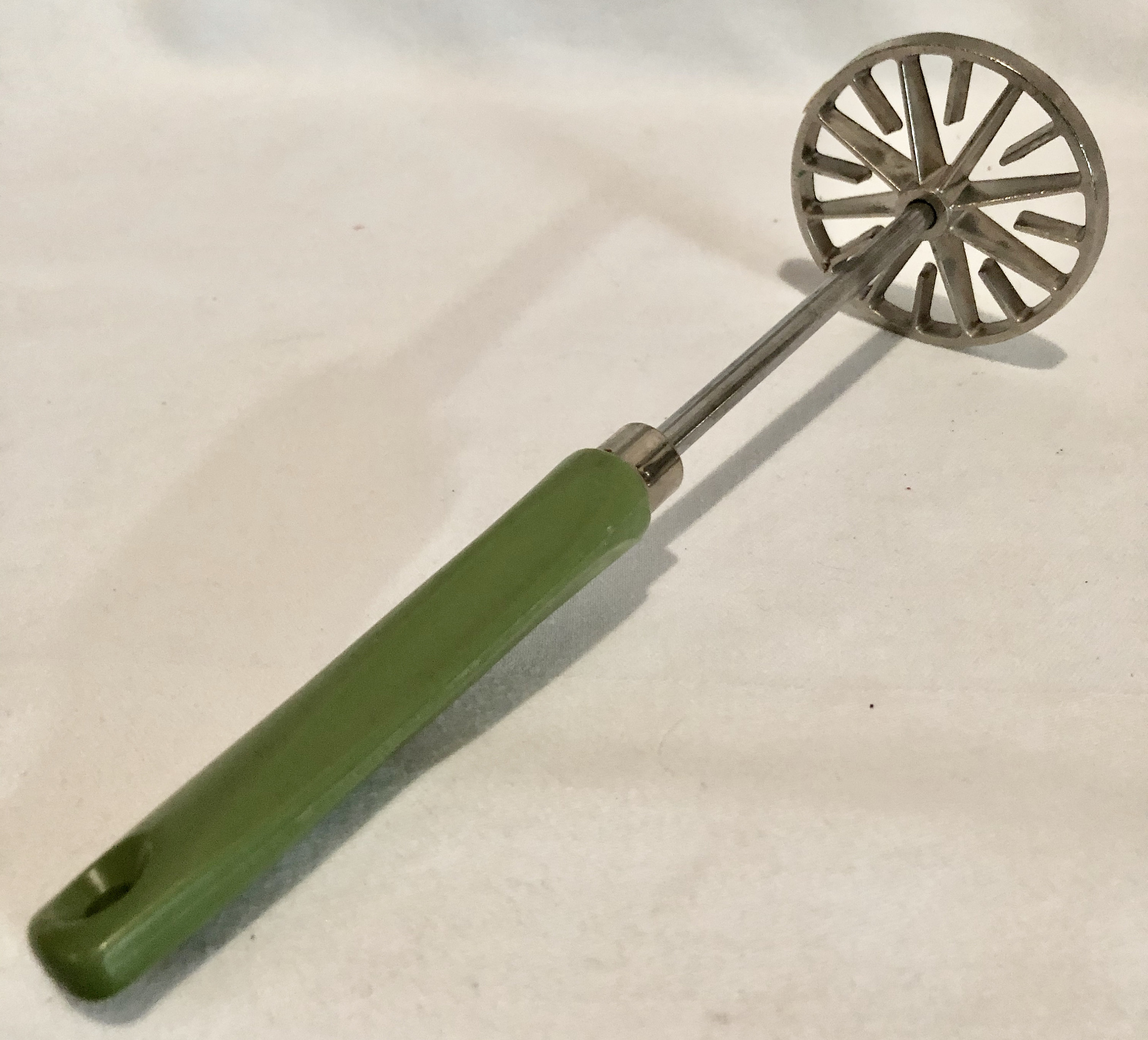 Vintage Metal Masher with Green Plastic Handle