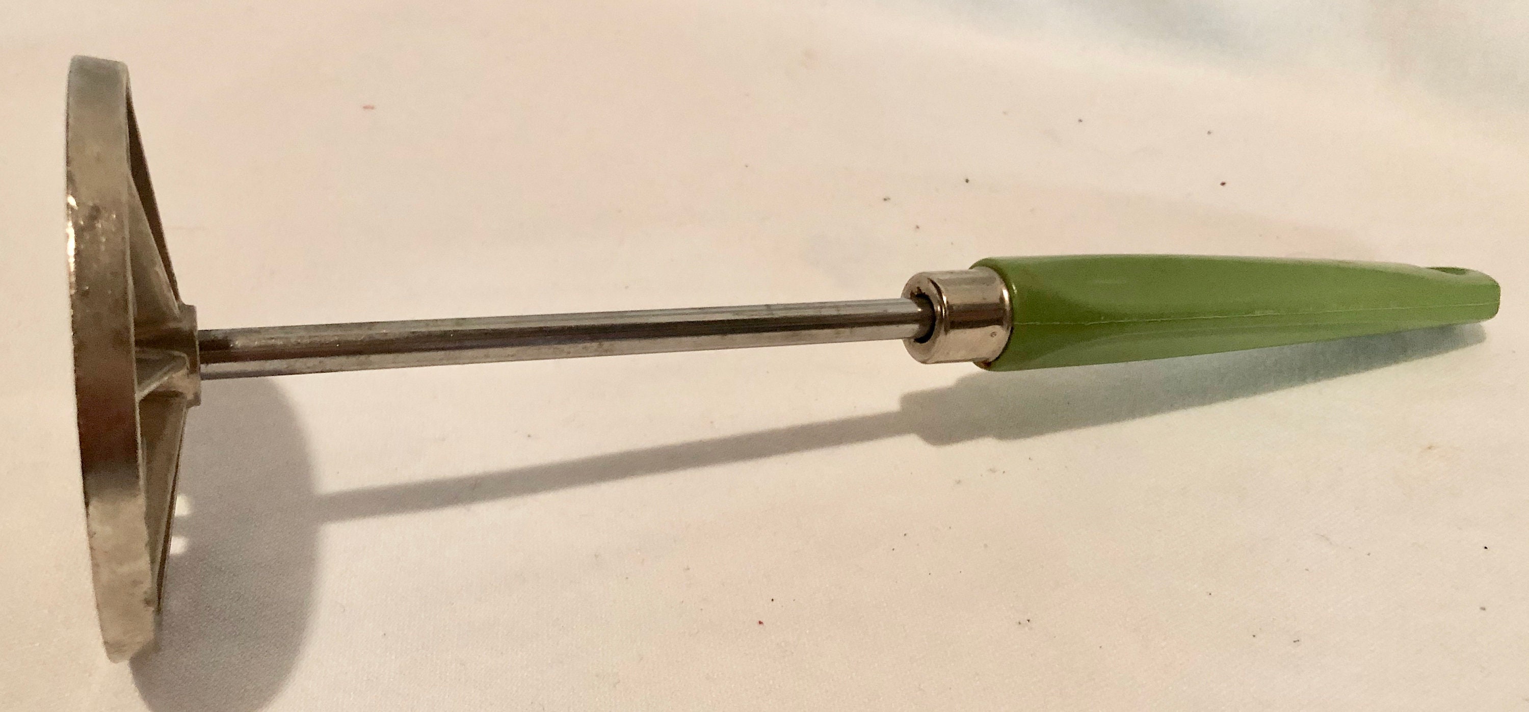 Vintage Metal Masher with Green Plastic Handle
