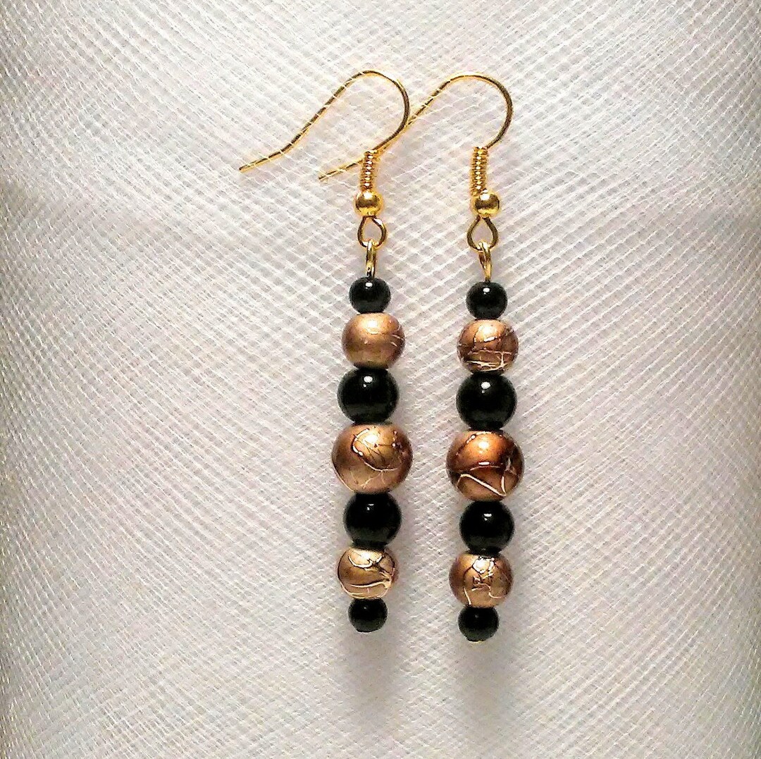 Long Saints NFL Black and Metallic Gold Team Color Glass Bead Earrings ...