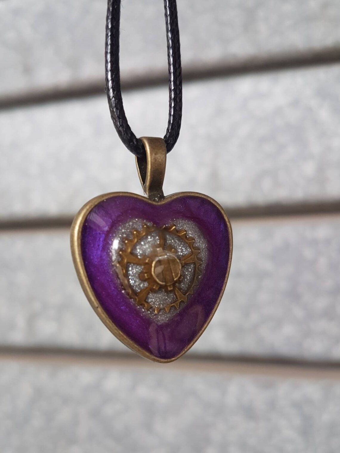 Chain with heart-shaped pendant: amulet with gear in bronze on | Etsy