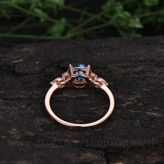 Blue rose gold ring store