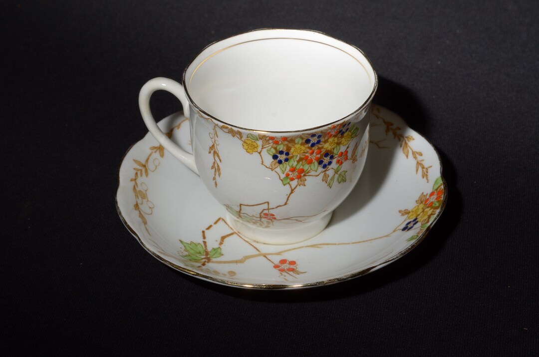 BELL CHINA Fine Bone China Teacup and Saucer Art Deco Raised Blue ...