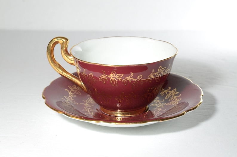 SPENCER STEVENSON Teacup and Saucer Burgundy Gold White Gold Band Red ...