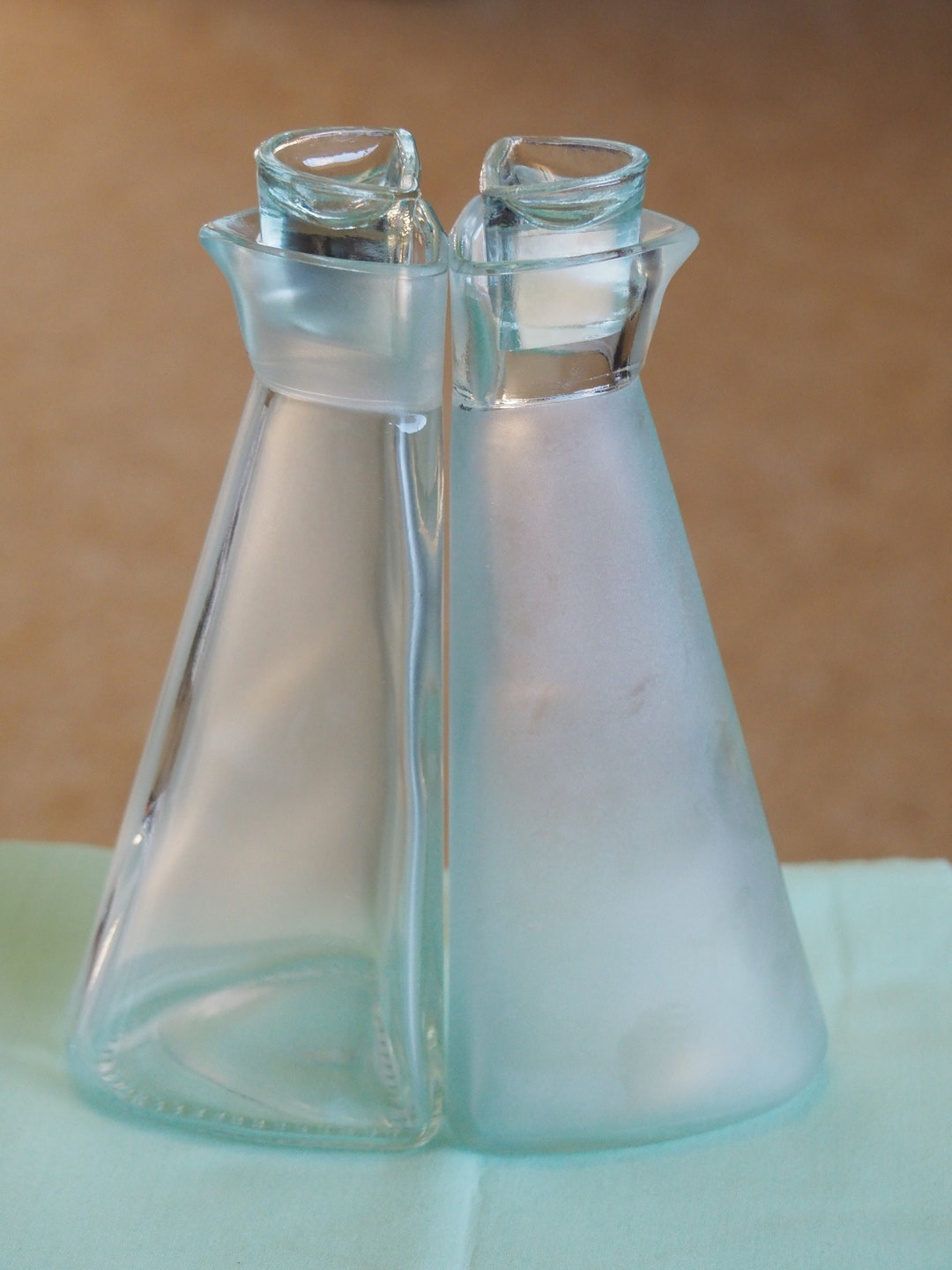 Two Oil / Vinegar Glass Triangle Shaped Jugs With Stoppers. Slight ...