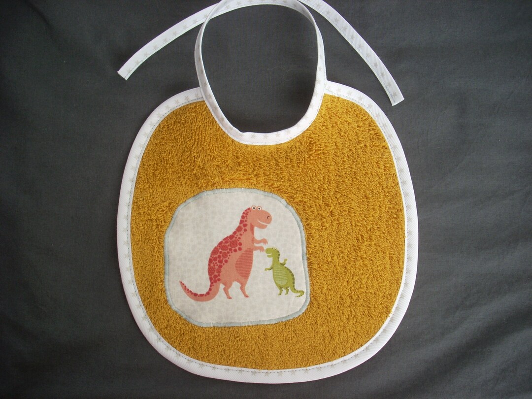 Baby Bib in Mustard Yellow Sponge With Applied Dinosaurs. - Etsy