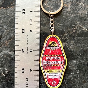 Jurassic Park Velociraptor Enclosure Acrylic Keychain | Life Finds a ...