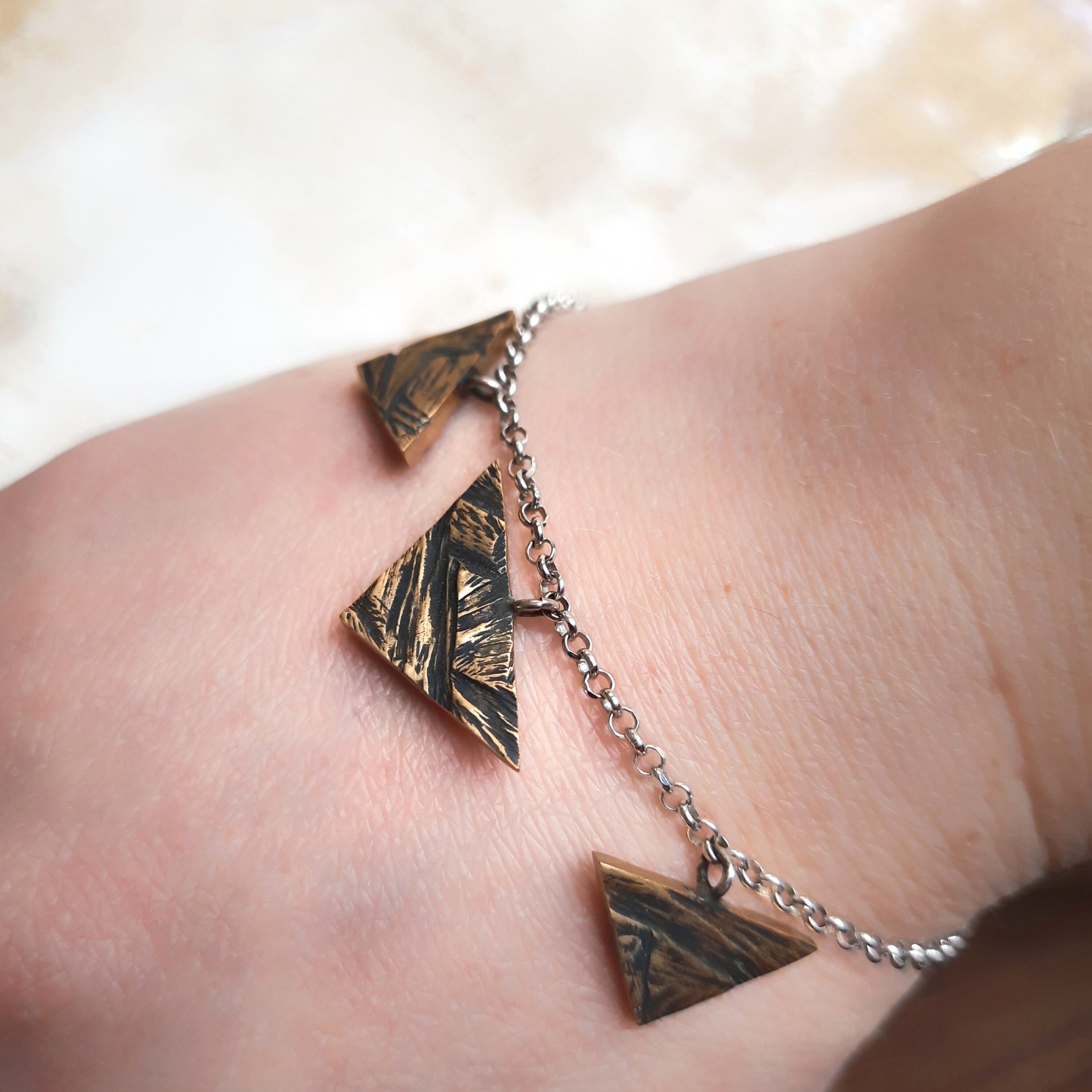 Bracelet with triangular charms in bronze and silver chain | Etsy