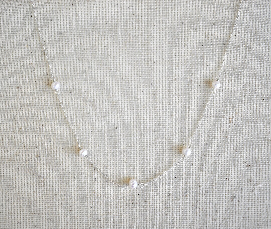 Floating Freshwater Pearl Necklace With 16 Inches Sterling Silver