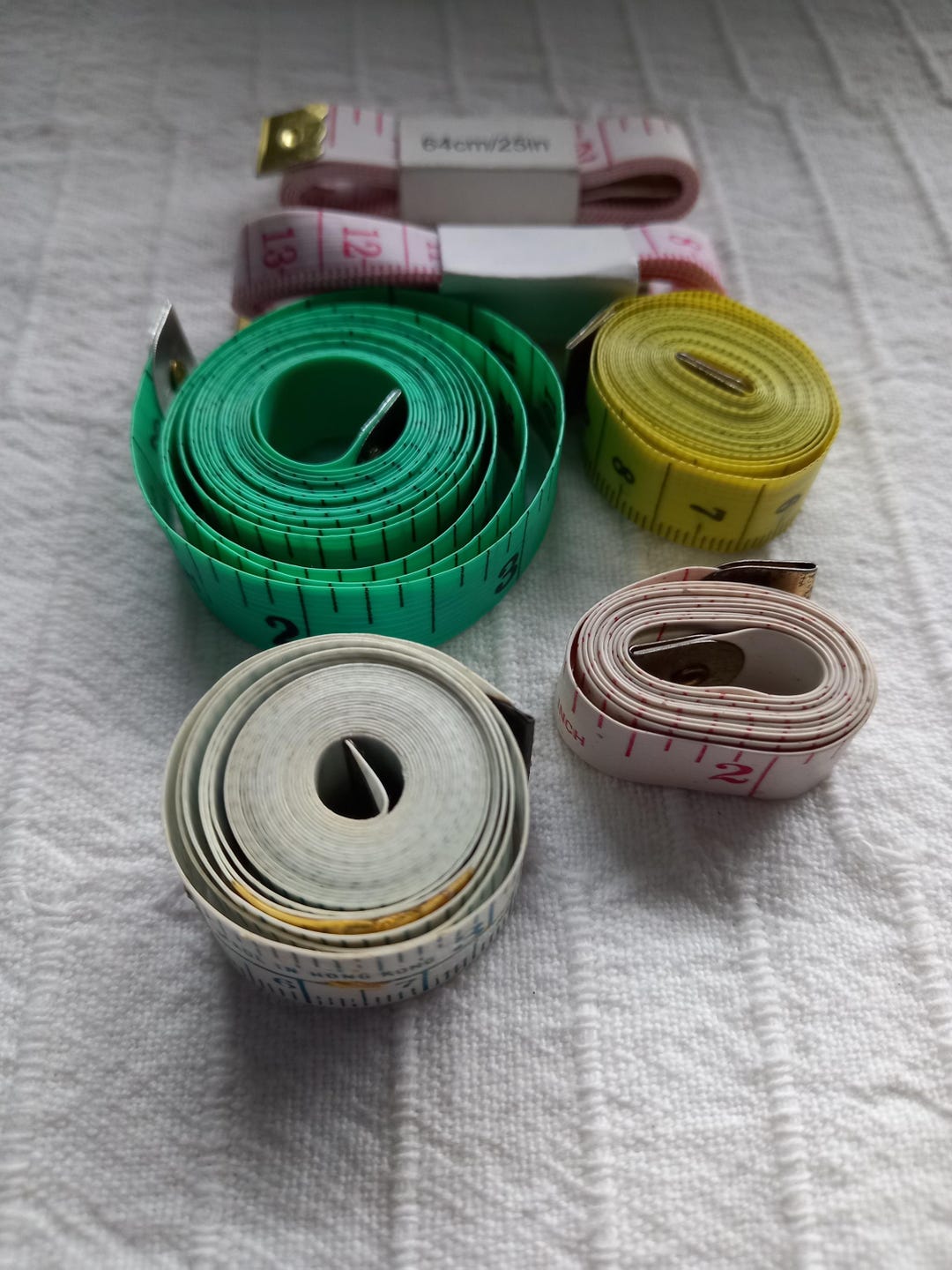 Four Plastic Tape Measures. Two as New. One Butterfly Brand Superior ...