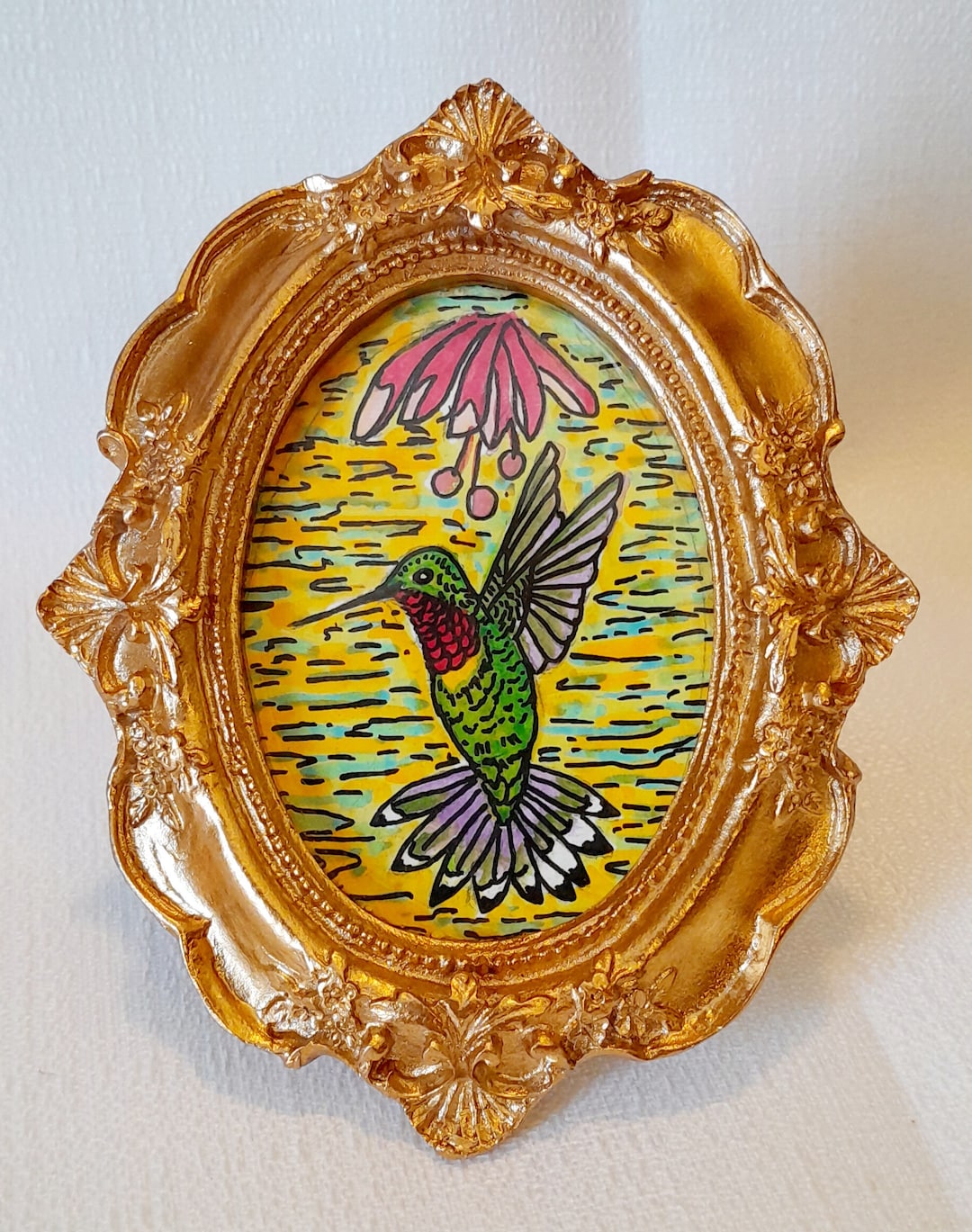 Obra de arte original de colibrí en marco ovalado de oro adornado ...