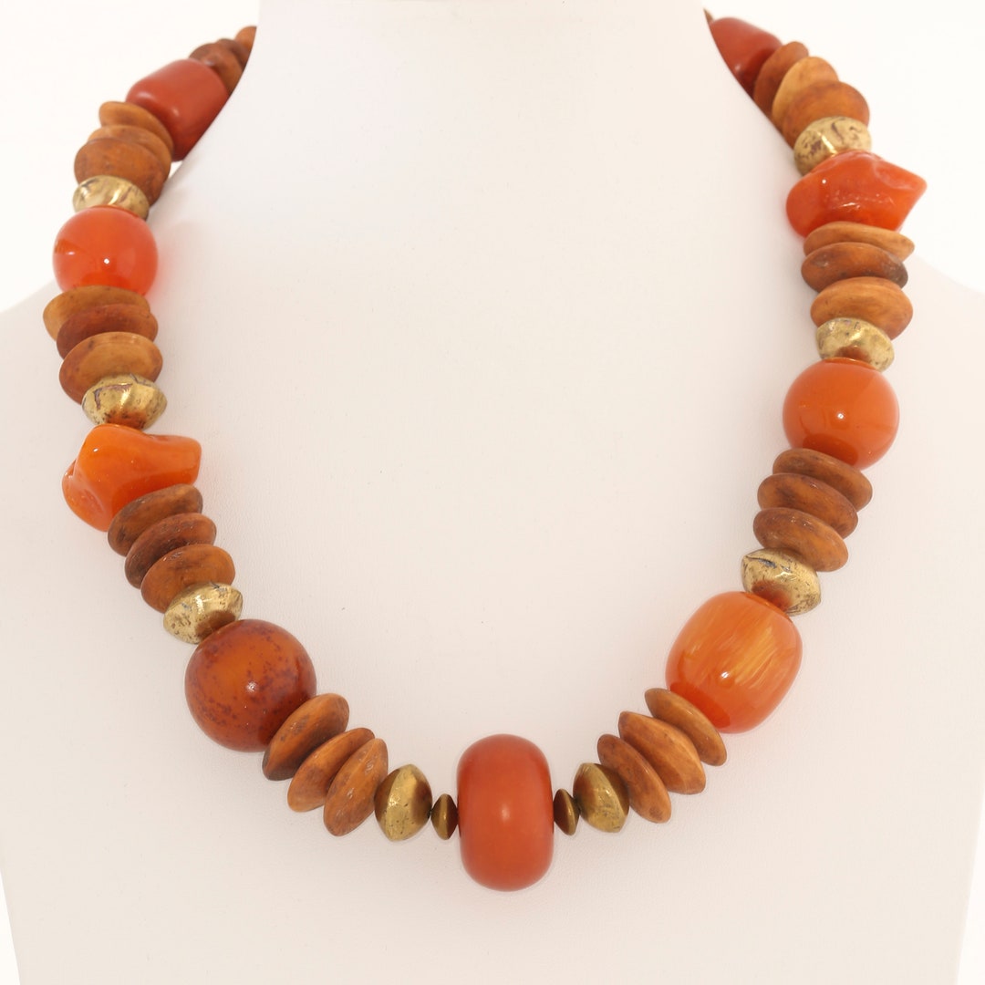 Assorted Shapes and Sizes of Henna and Butterscocth Amber With Bone and ...