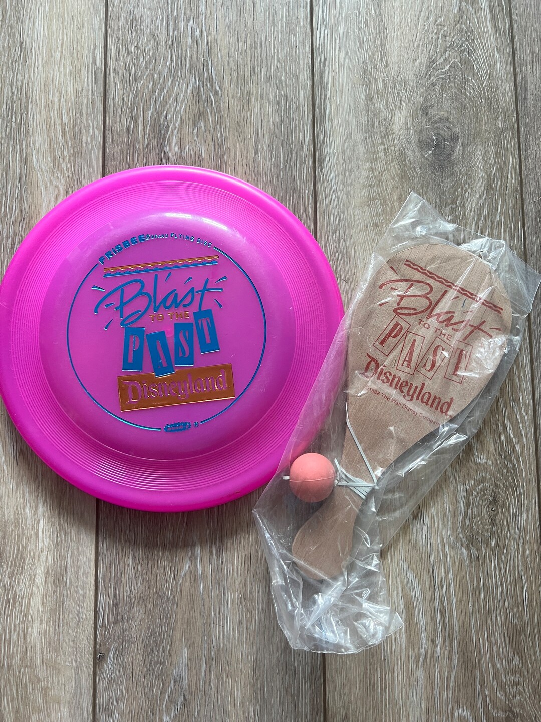 1988 Disneyland Blast to the Past Pink Frisbee and Paddle Ball Set ...