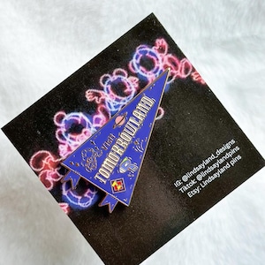 Visit Tomorrowland - Pennant | Enamel Pin - Etsy