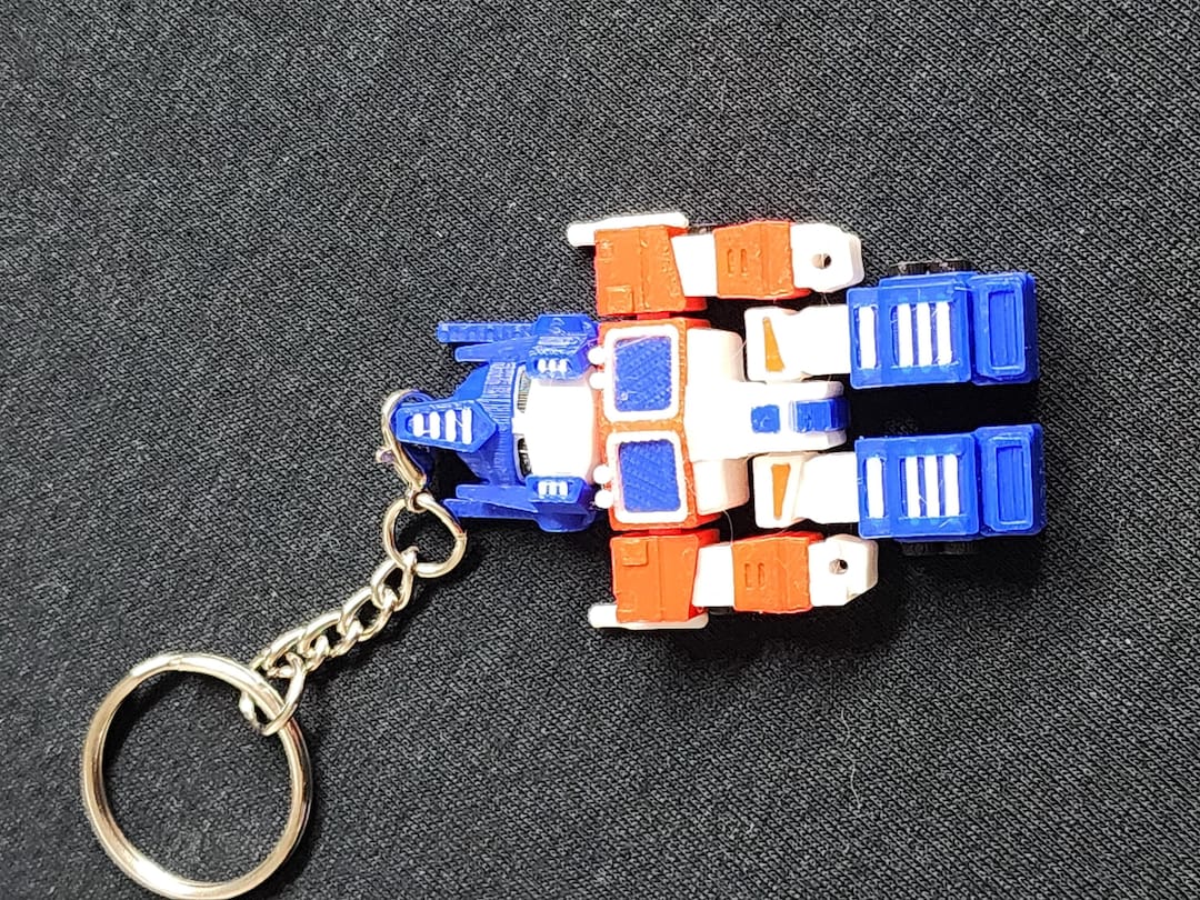 3D Printed Articulated Optimus Prime Keychain Transformer - Etsy
