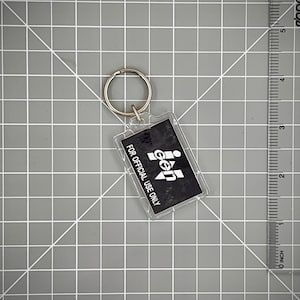 Jurassic World ACU Keychain - Etsy