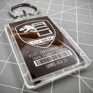Jurassic World ACU Keychain - Etsy