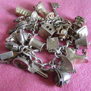 Nuvo Vintage Sterling Silver Charm Bracelet With 20 Nuvo Charms - Etsy
