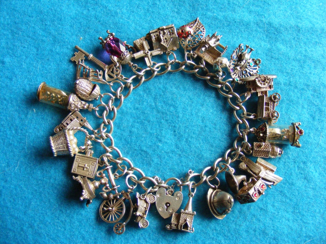 Rare Nuvo Vintage Sterling Silver Charm Bracelet With 25 Nuvo Charms ...