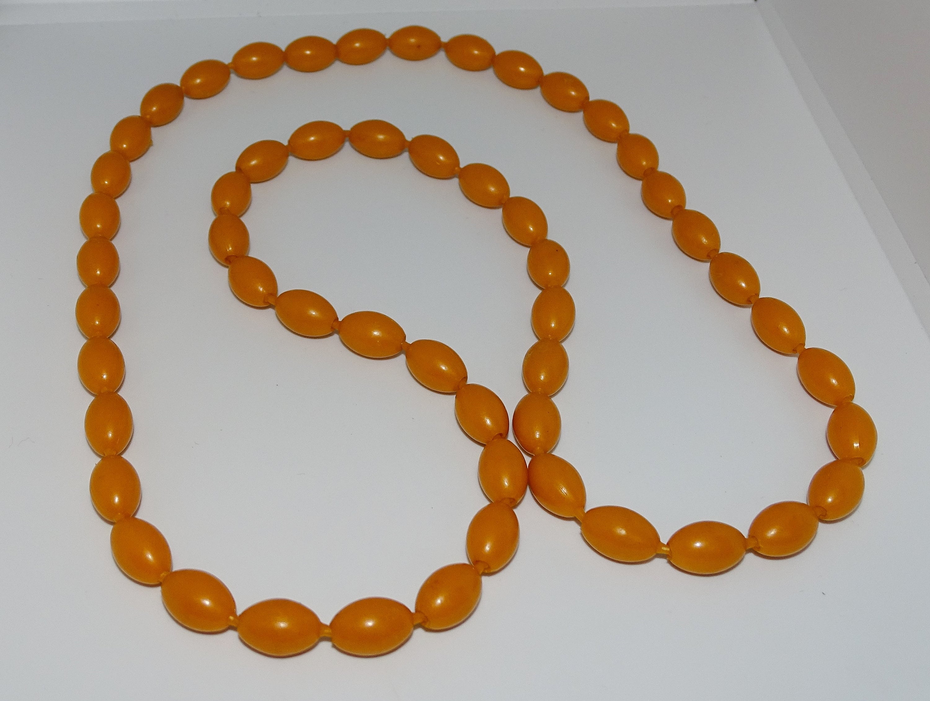 Vintage Retro Popper Poppet Orange Coloured Oval Shaped Plastic Beads ...