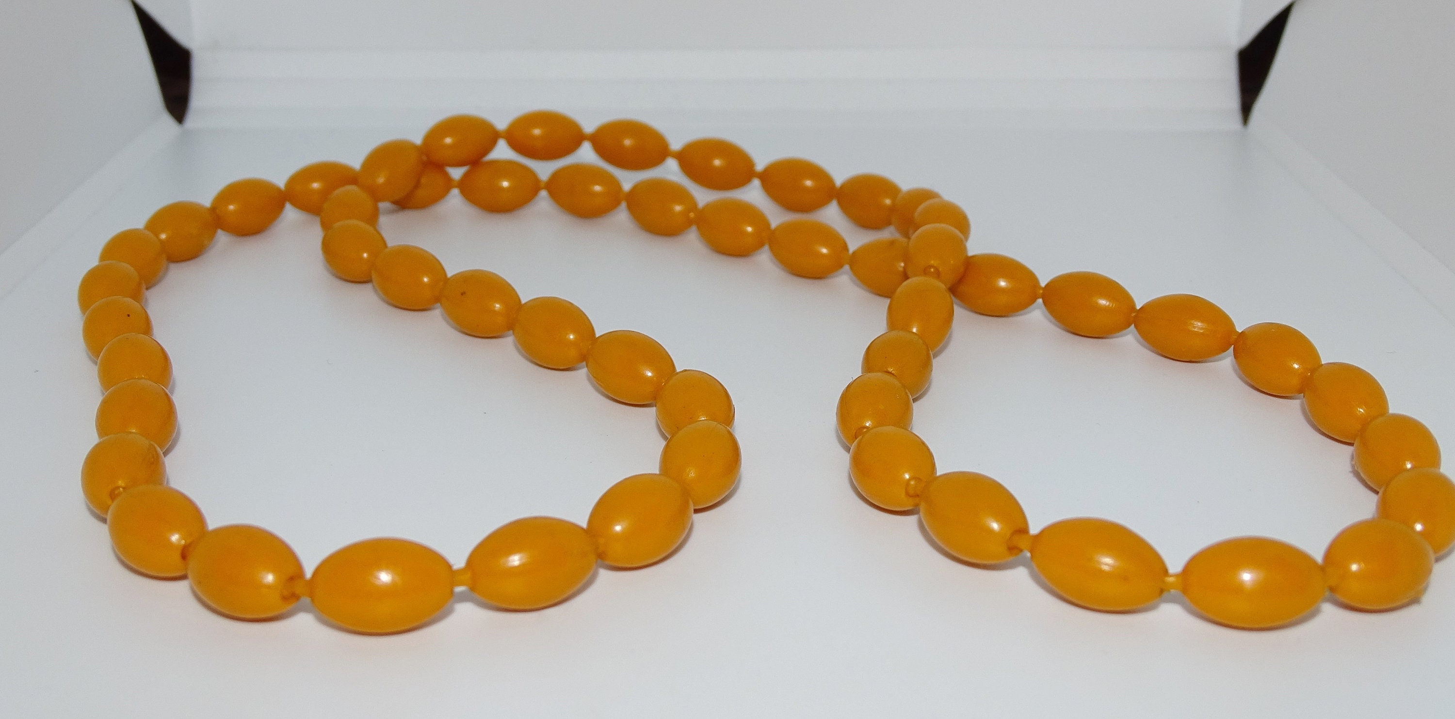 Vintage Retro Popper Poppet Orange Coloured Oval Shaped Plastic Beads ...