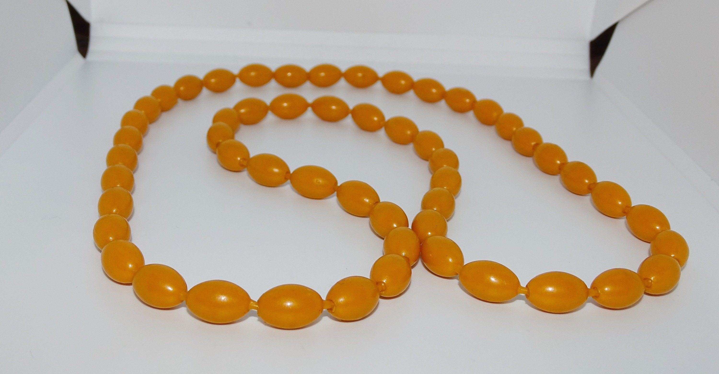 Vintage Retro Popper Poppet Orange Coloured Oval Shaped Plastic Beads ...