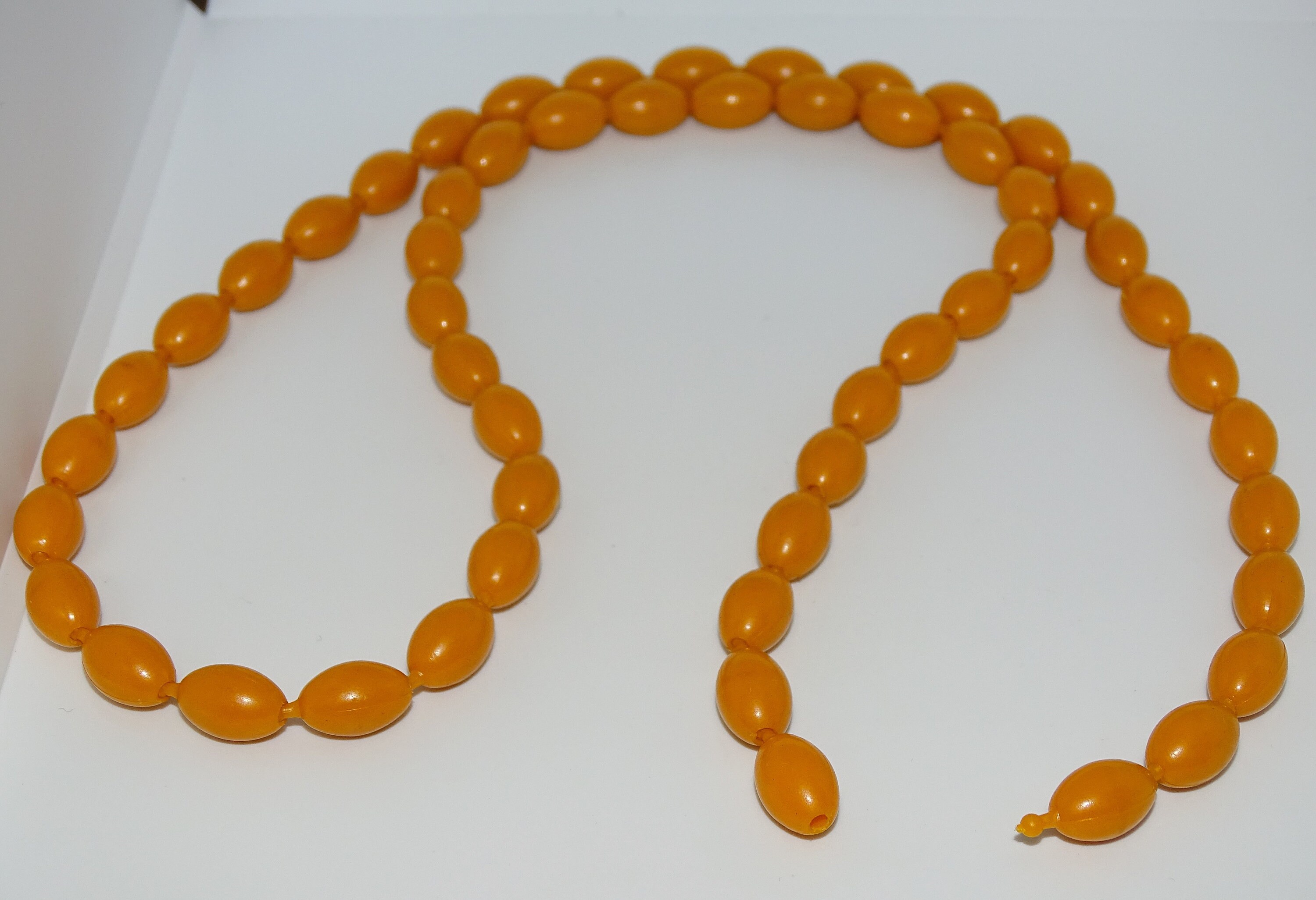 Vintage Retro Popper Poppet Orange Coloured Oval Shaped Plastic Beads ...