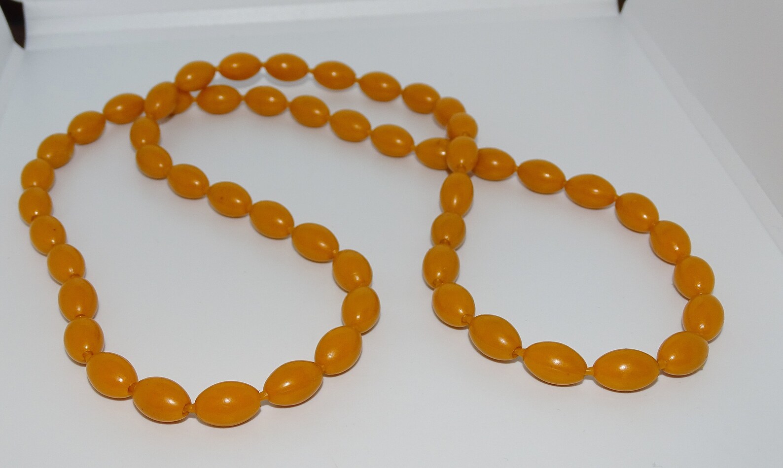 Vintage Retro Popper Poppet Orange Coloured Oval Shaped Plastic Beads ...
