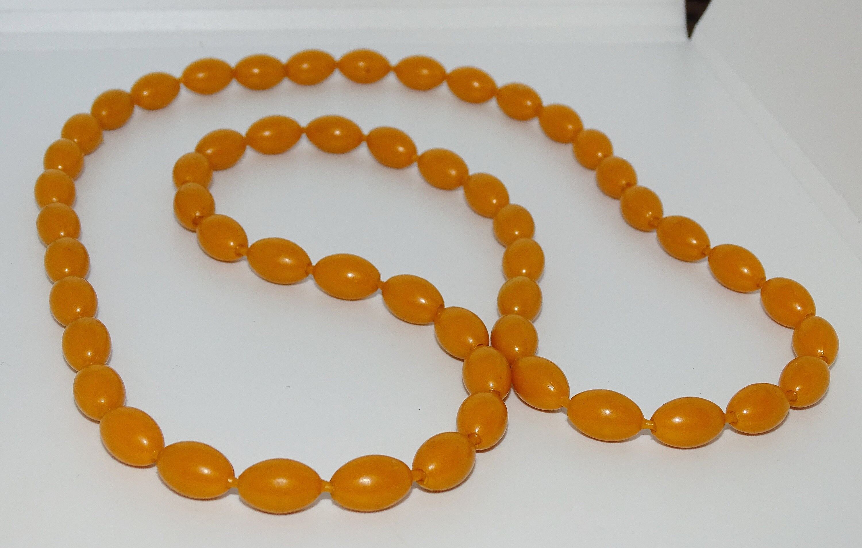 Vintage Retro Popper Poppet Orange Coloured Oval Shaped Plastic Beads ...