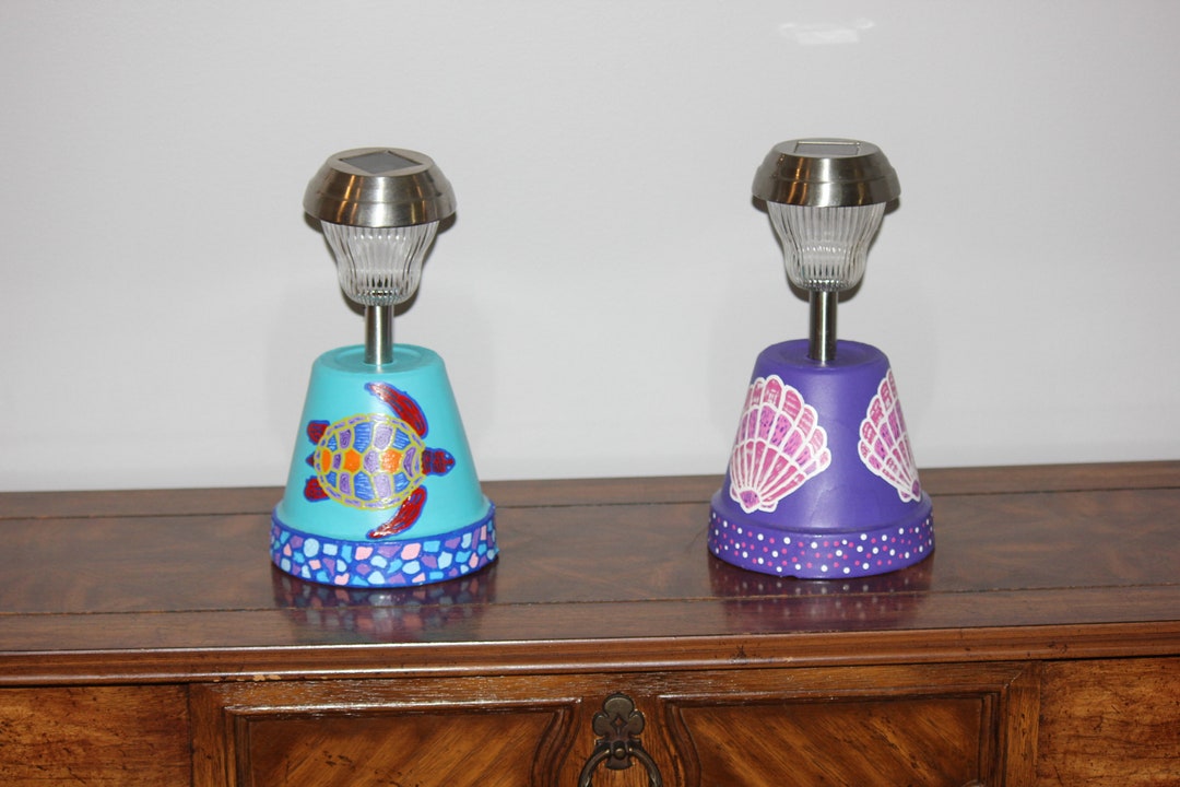 Hand Painted Solar Light Holder With Attractive Solar Light. Two ...