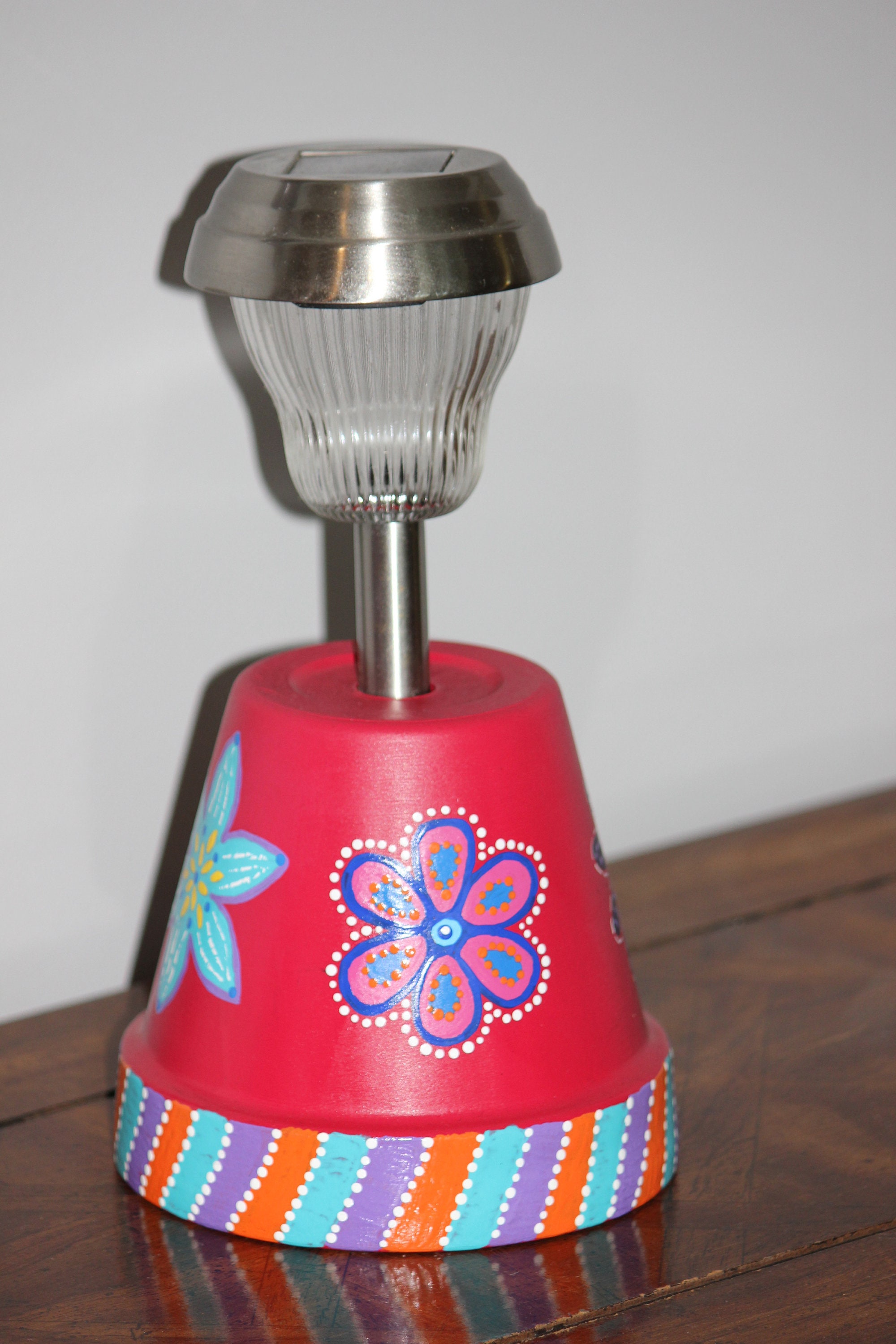 Hand Painted Clay Pot Solar Light Holder With an Attractive Solar Light ...