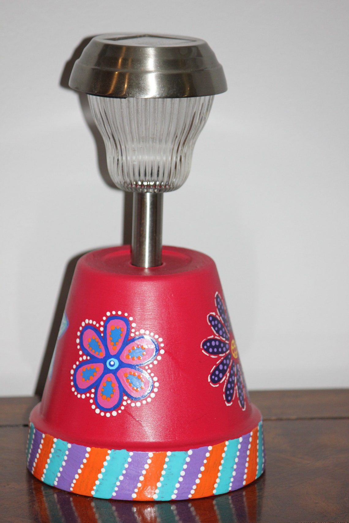 Hand Painted Clay Pot Solar Light Holder With an Attractive Solar Light ...