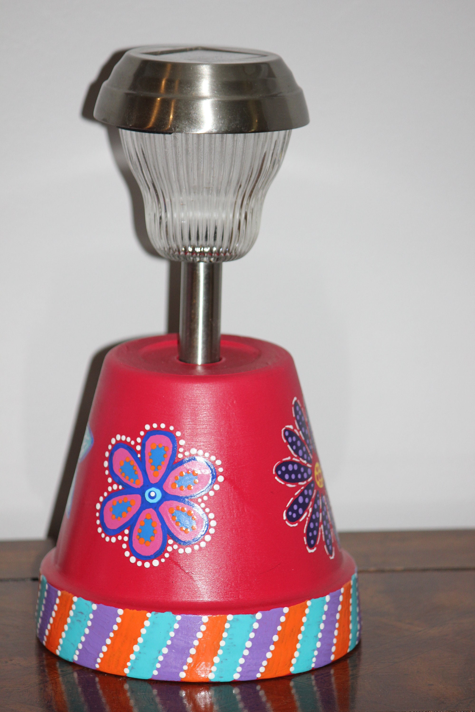 Hand Painted Clay Pot Solar Light Holder With an Attractive Solar Light ...