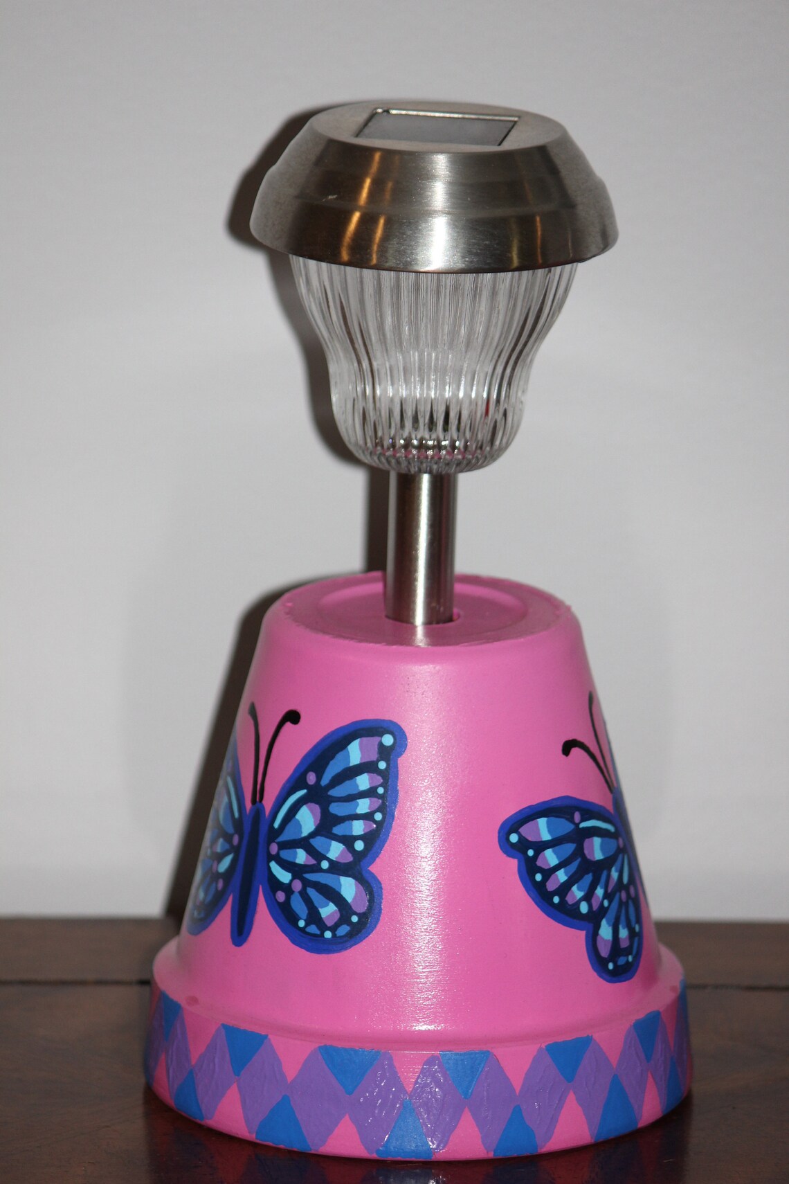 Hand Painted Clay Pot Solar Light Holder With an Attractive Solar Light ...
