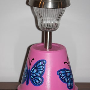 Hand Painted Clay Pot Solar Light Holder With an Attractive Solar Light ...