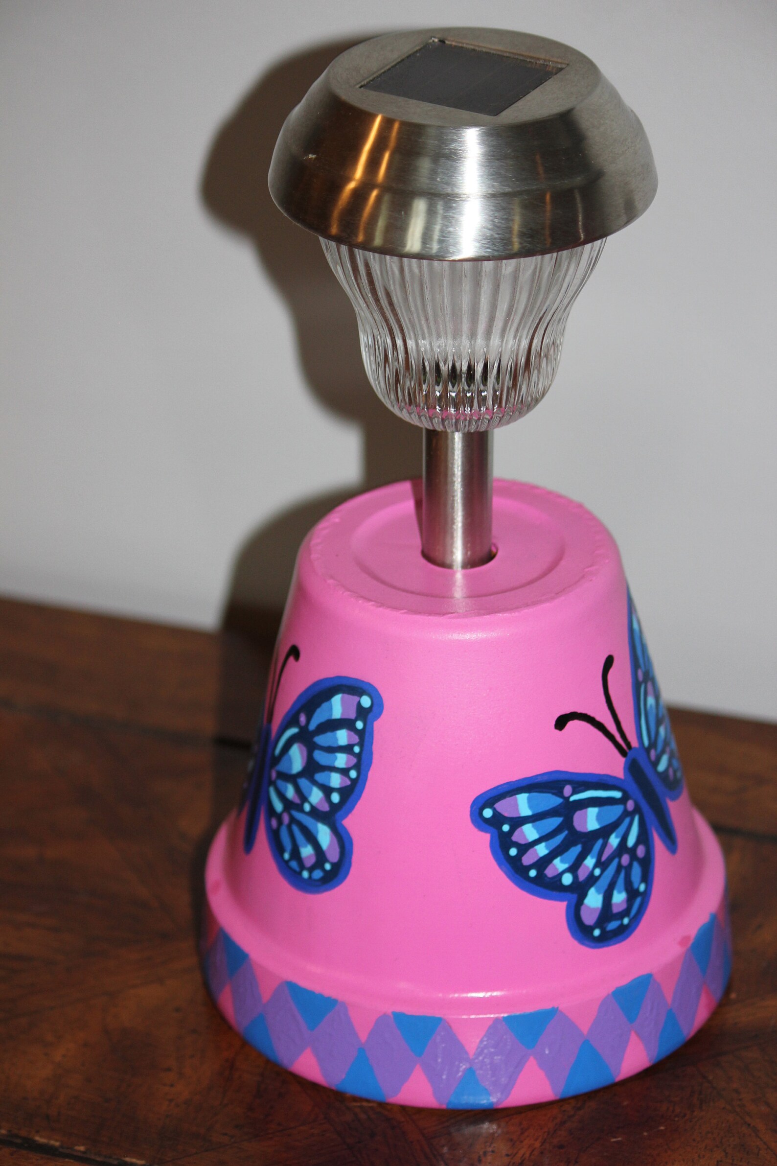 Hand Painted Clay Pot Solar Light Holder With an Attractive Solar Light ...