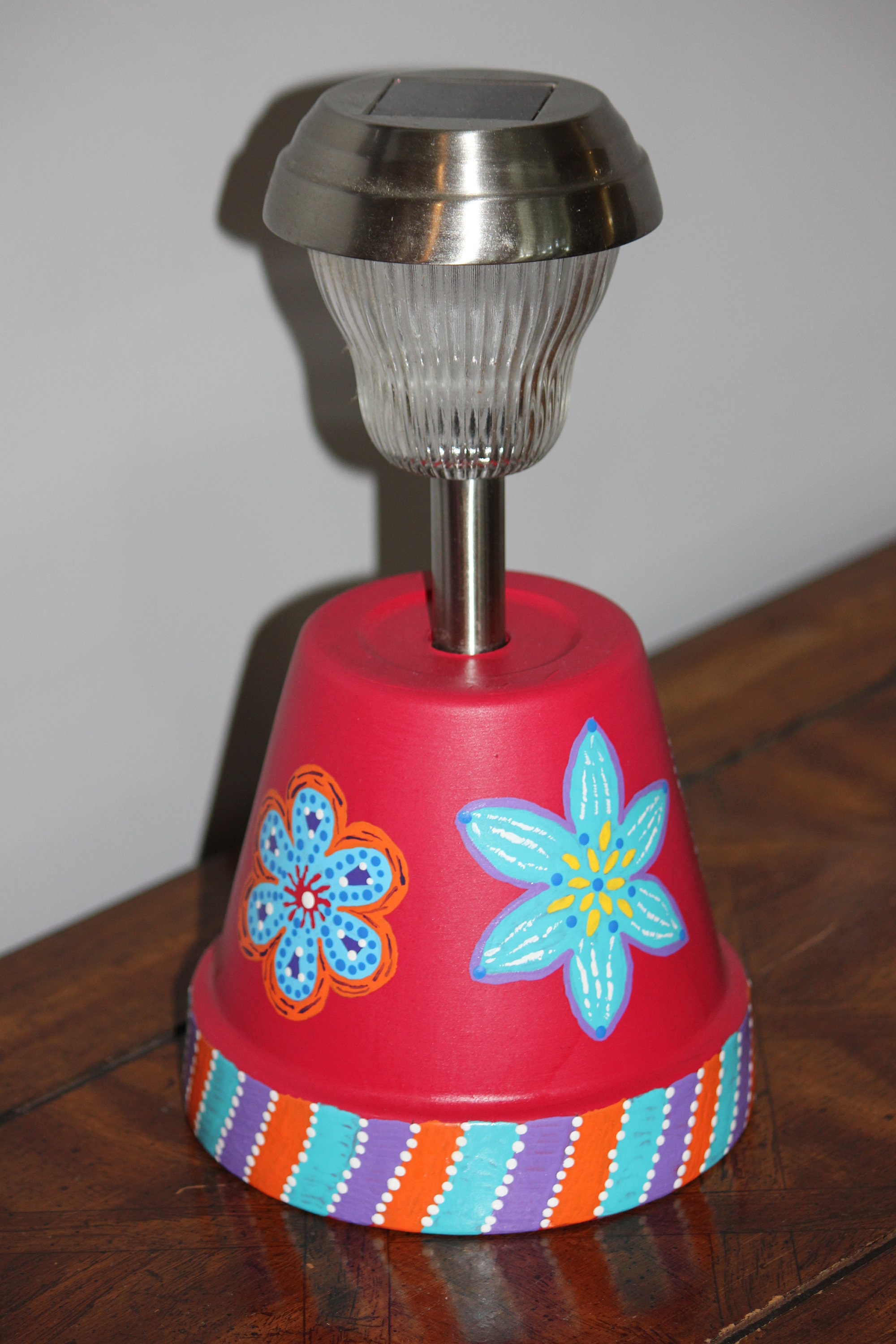 Hand Painted Clay Pot Solar Light Holder With an Attractive Solar Light ...