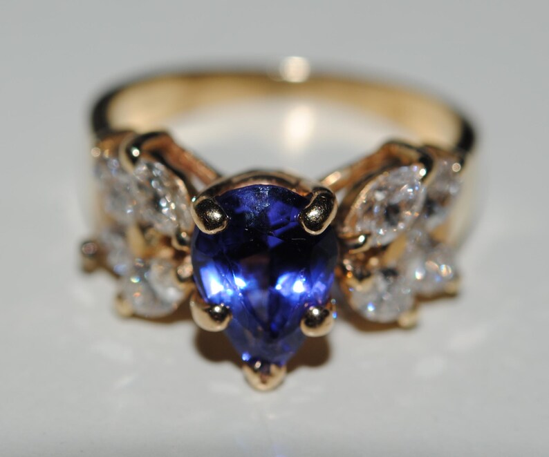 Beautiful Pear Shaped Tanzanite Gemstone Multiple Marquis Diamond ...