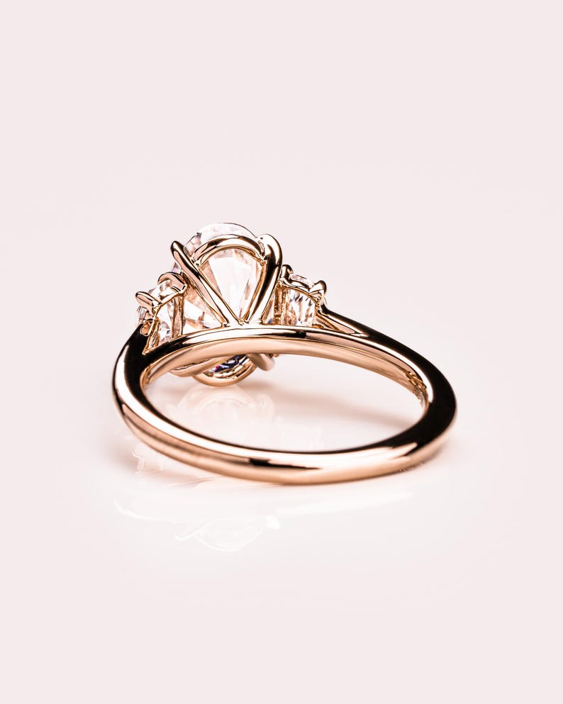 Blair - Center Stone Oval Cut & Side Stones Half Moon Cut Moissanite ...