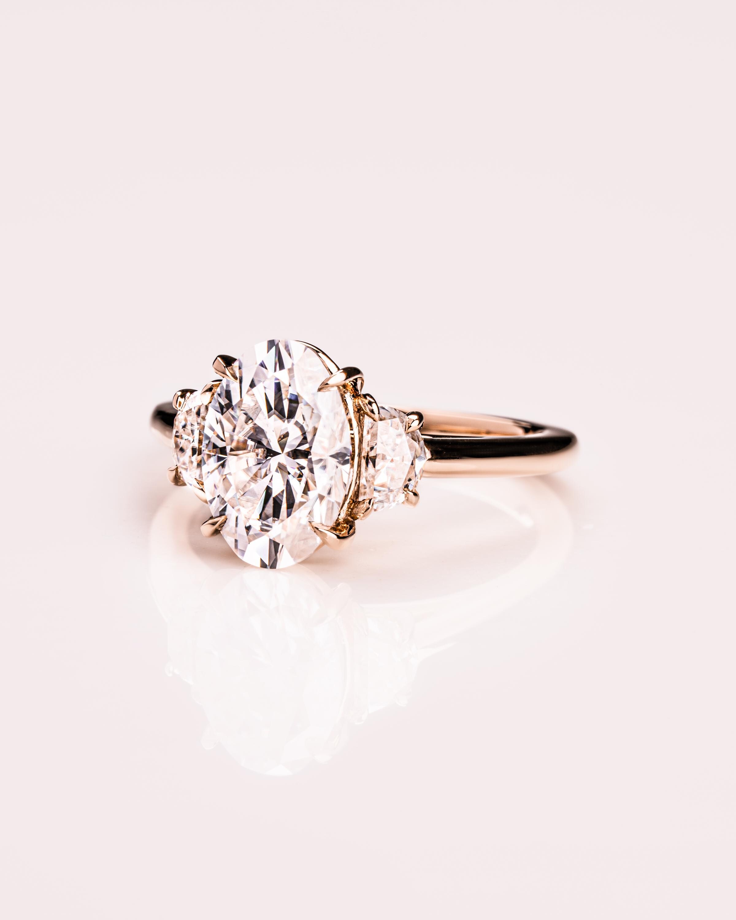Blair - Center Stone Oval Cut & Side Stones Half Moon Cut Moissanite ...