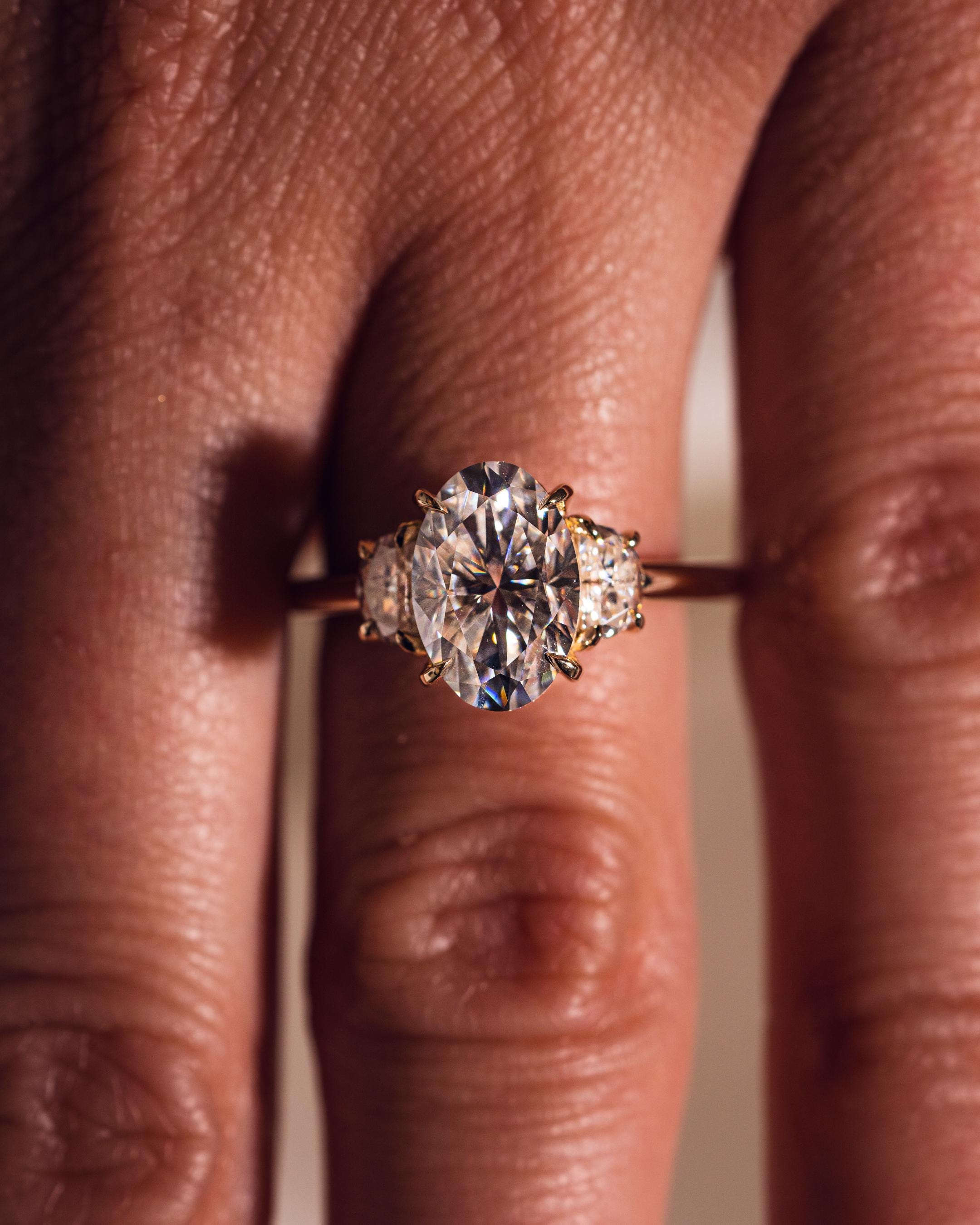 Blair - Center Stone Oval Cut & Side Stones Half Moon Cut Moissanite ...