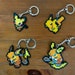 Pichu, Pikachu, Raichu and Alolan Raichu Pokemon Keychains, Pins ...