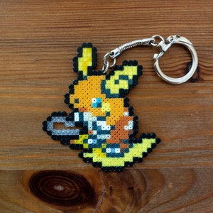Pichu, Pikachu, Raichu and Alolan Raichu Pokemon Keychains, Pins ...